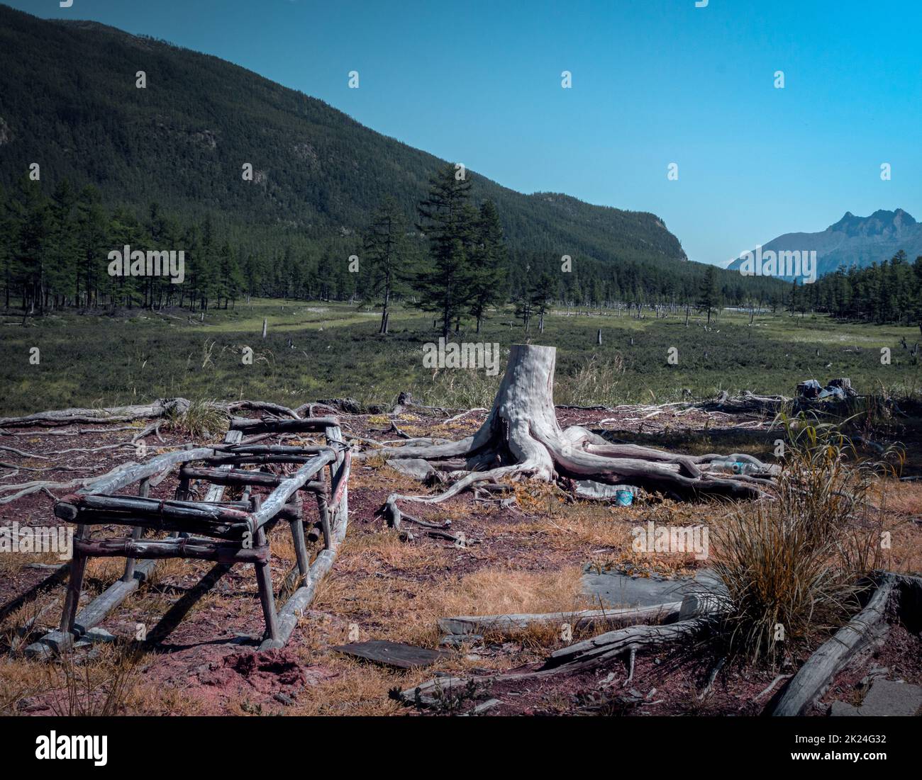 Mountain landscape in Kodar with wooden sleigh and old stump Stock ...