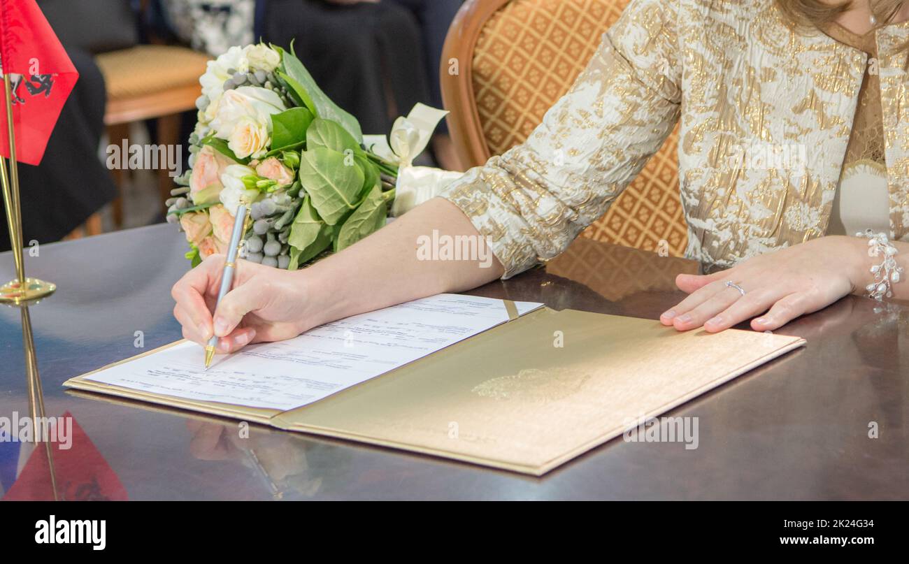 the fragmentary portrait of woman who sign marriage commitment colored ...