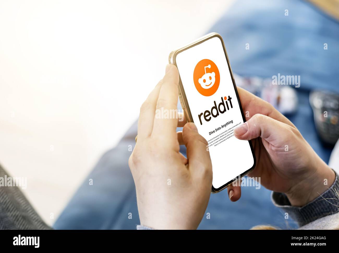 Rome, Italy, January 2022: woman holding a smart phone with Reddit ...