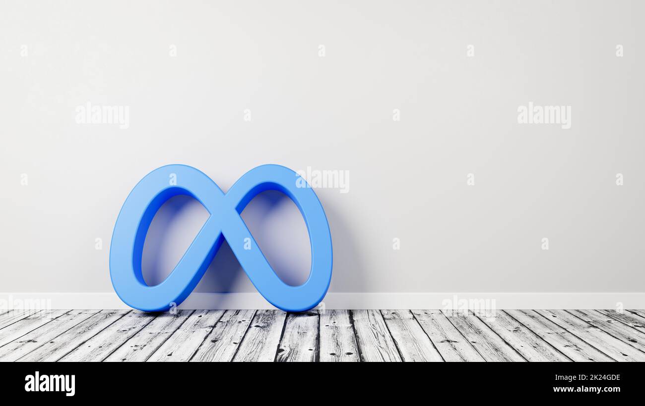 Meta Logo 3D Symbol Shape on Wooden Floor Against Gray Wall with Copy ...