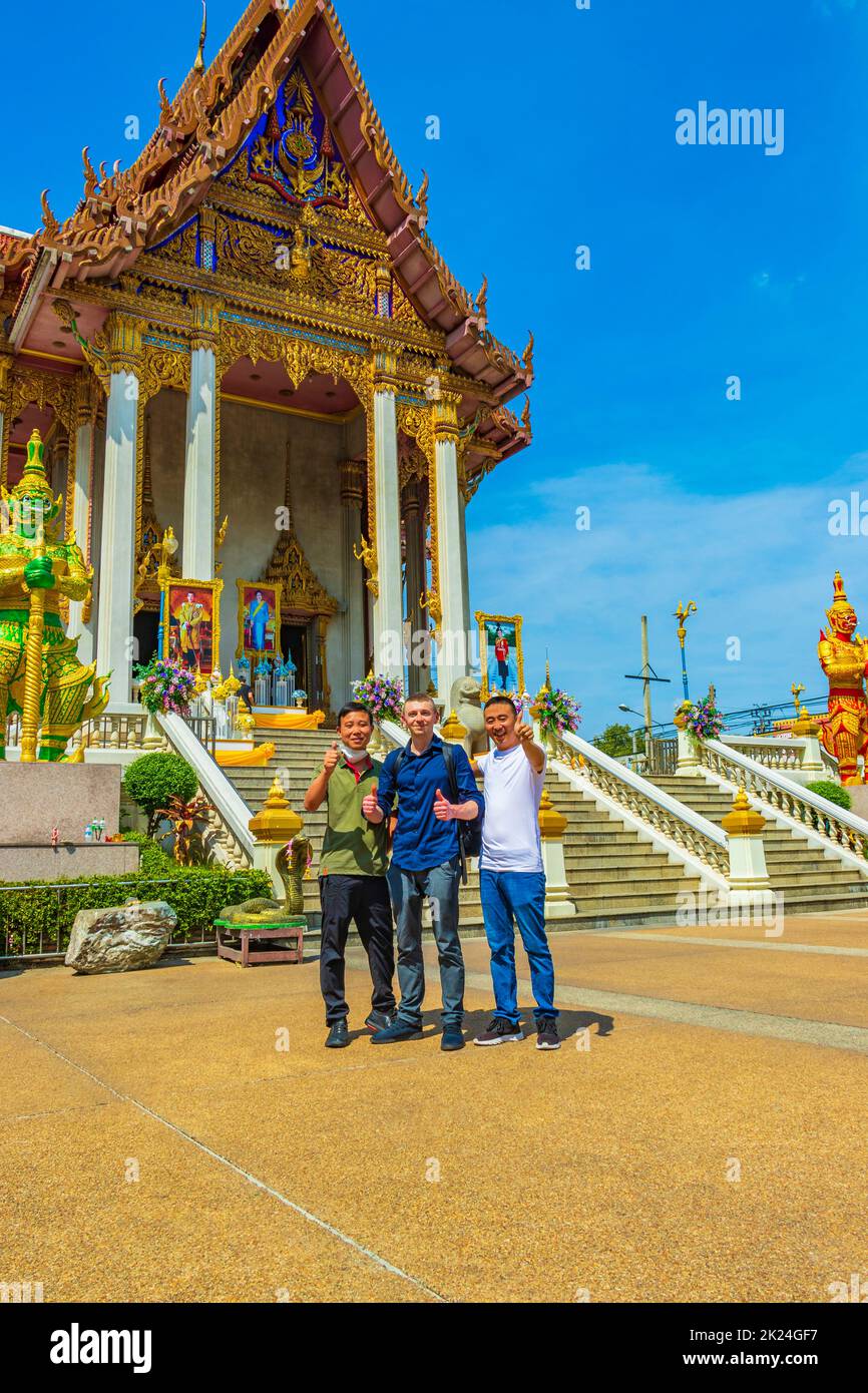 Tourists visit the amazing colorful Wat Don Mueang Phra Arramluang ...