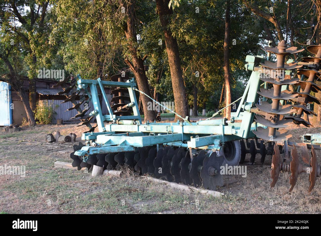 The disk harrow. Agricultural machinery for processing of the soil in ...