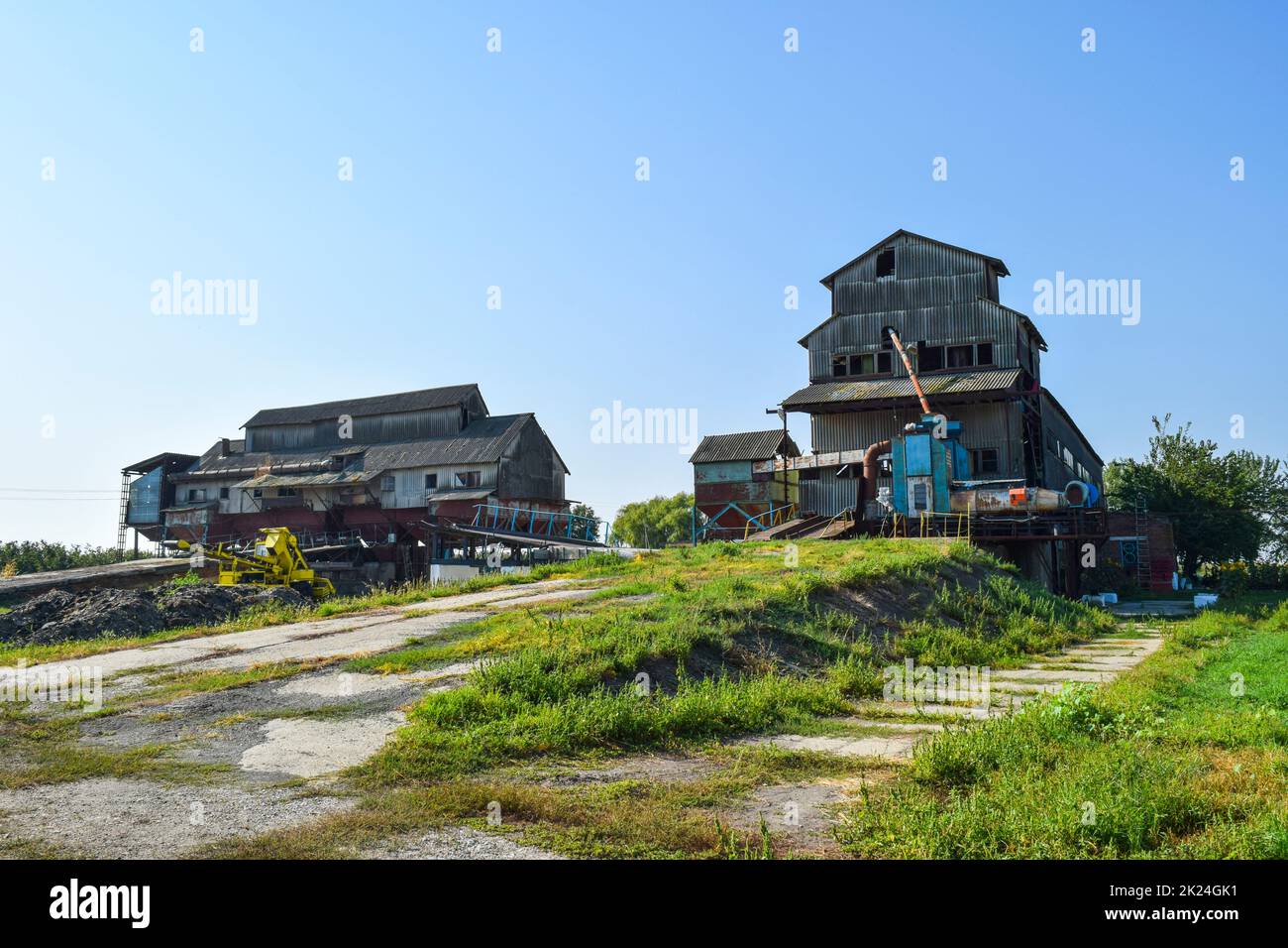 The old building for storing and pouring grain. The grain mill Stock ...