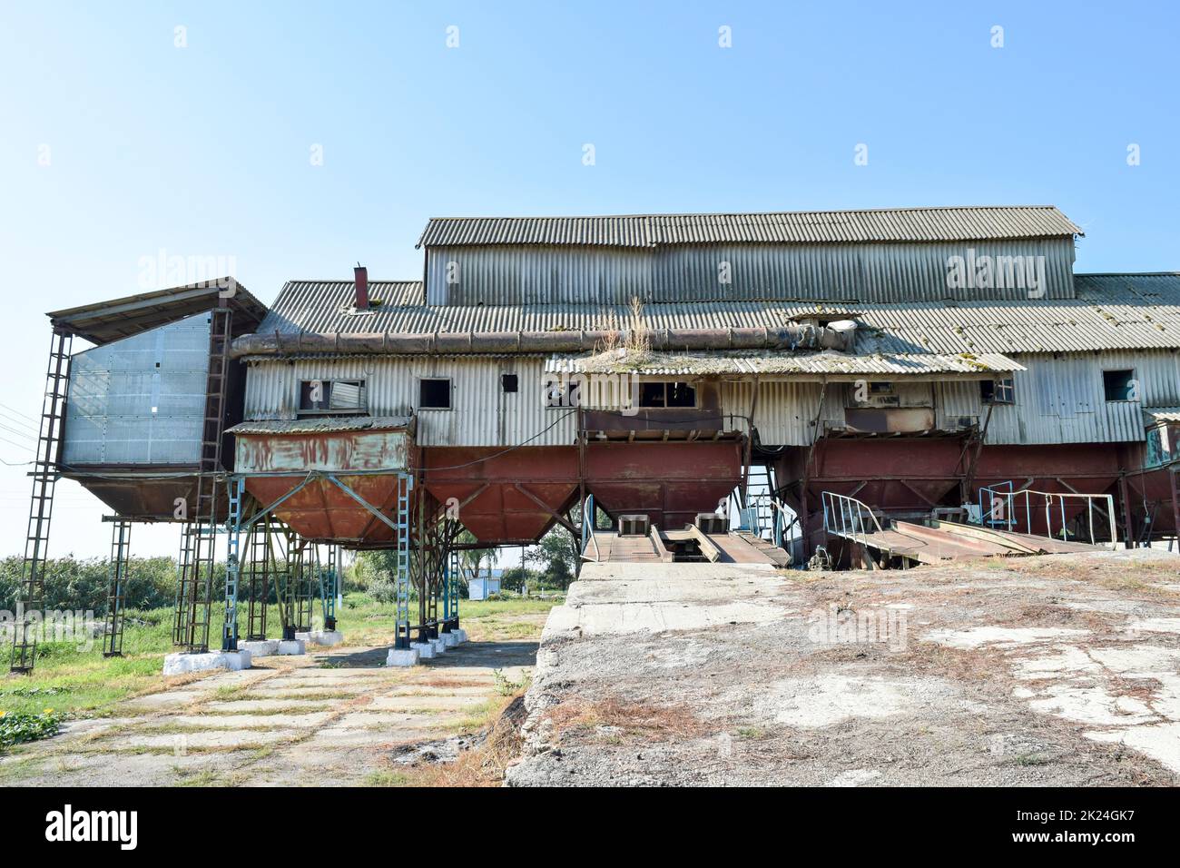 The old building for storing and pouring grain. The grain mill Stock ...