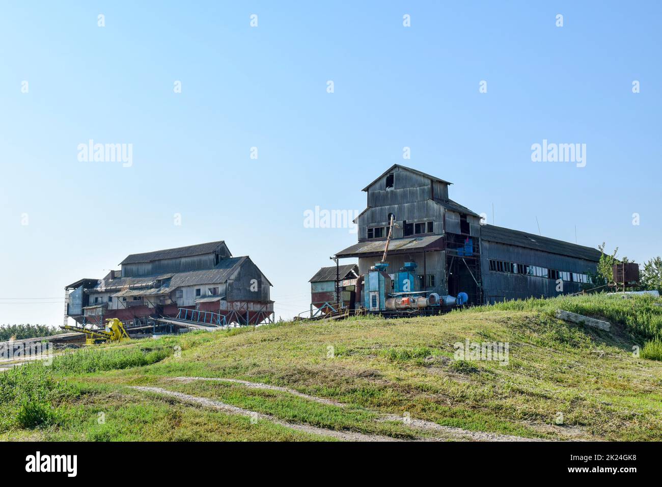 The old building for storing and pouring grain. The grain mill Stock ...