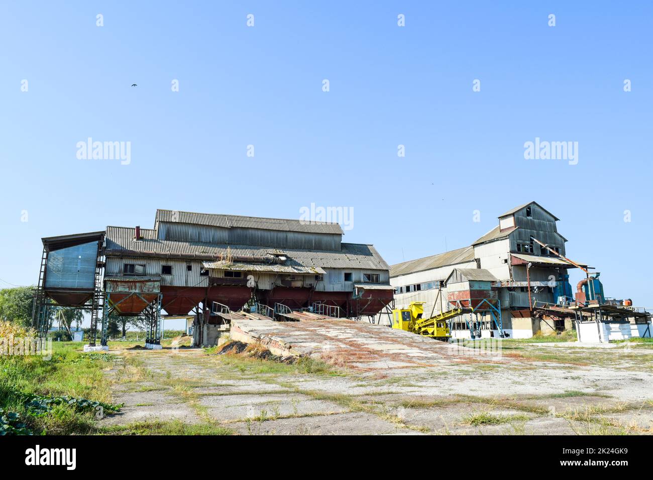 The old building for storing and pouring grain. The grain mill Stock ...