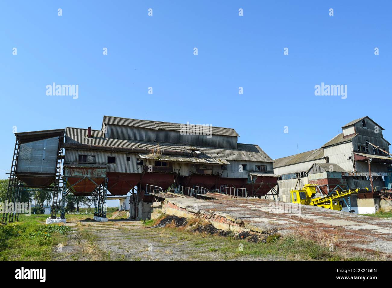 The old building for storing and pouring grain. The grain mill Stock ...