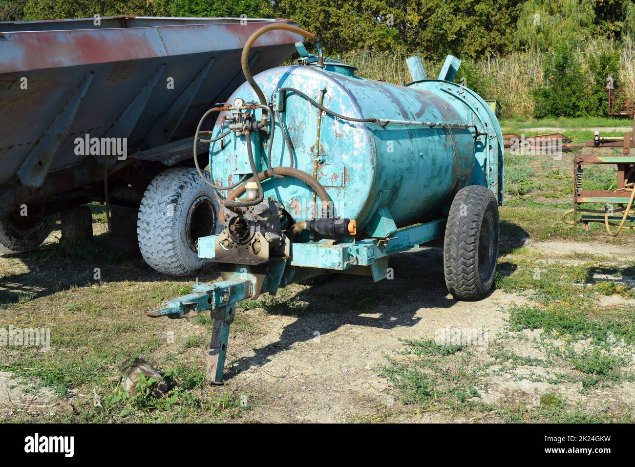 Sprinkler liquid fertilizer. Tank for herbicides and fertilizers Stock ...