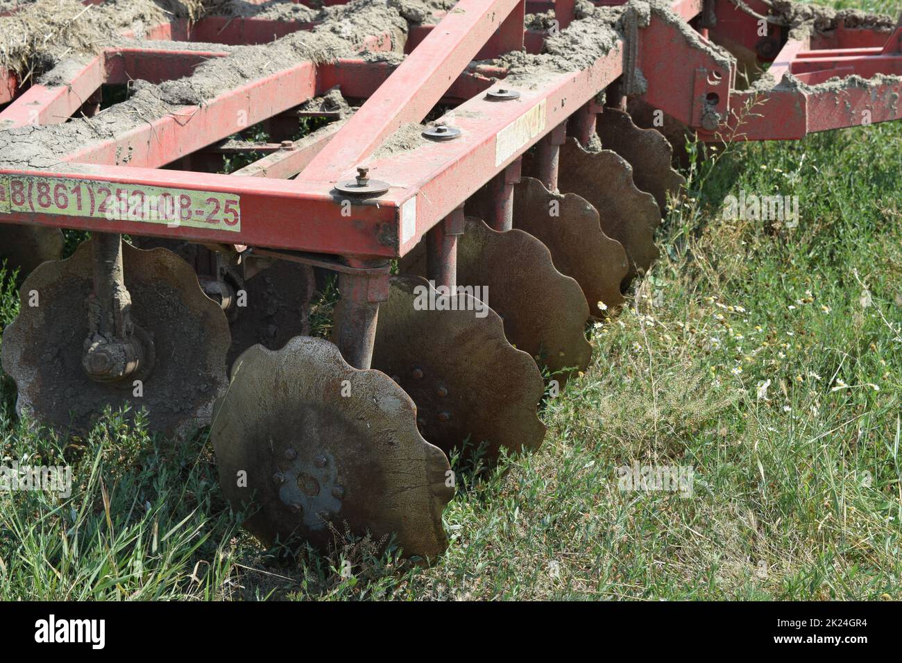 The disk harrow. Agricultural machinery for processing of the soil in ...