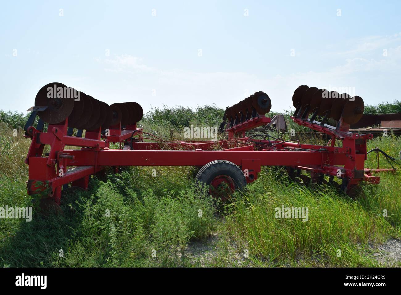 The disk harrow. Agricultural machinery for processing of the soil in ...