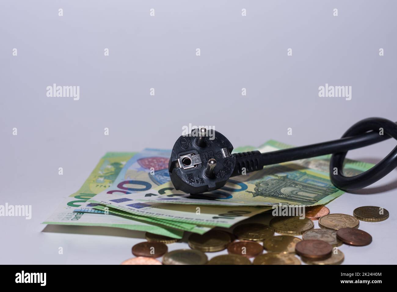 Energy prices increase and energy consumption power cable with knot ...