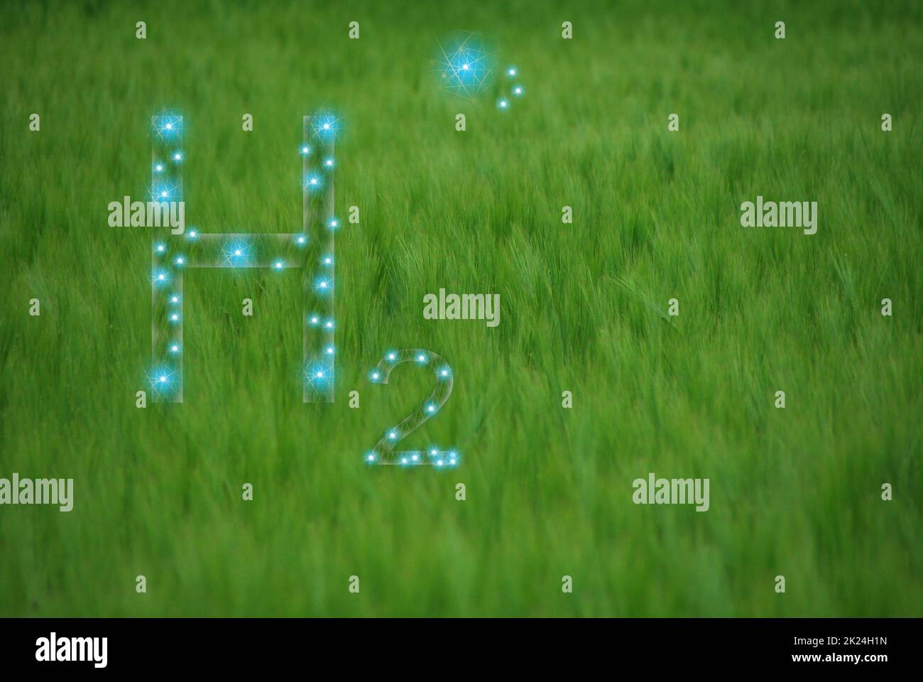 green meadow and h2 hydrogen letters for energy with green and blue ...