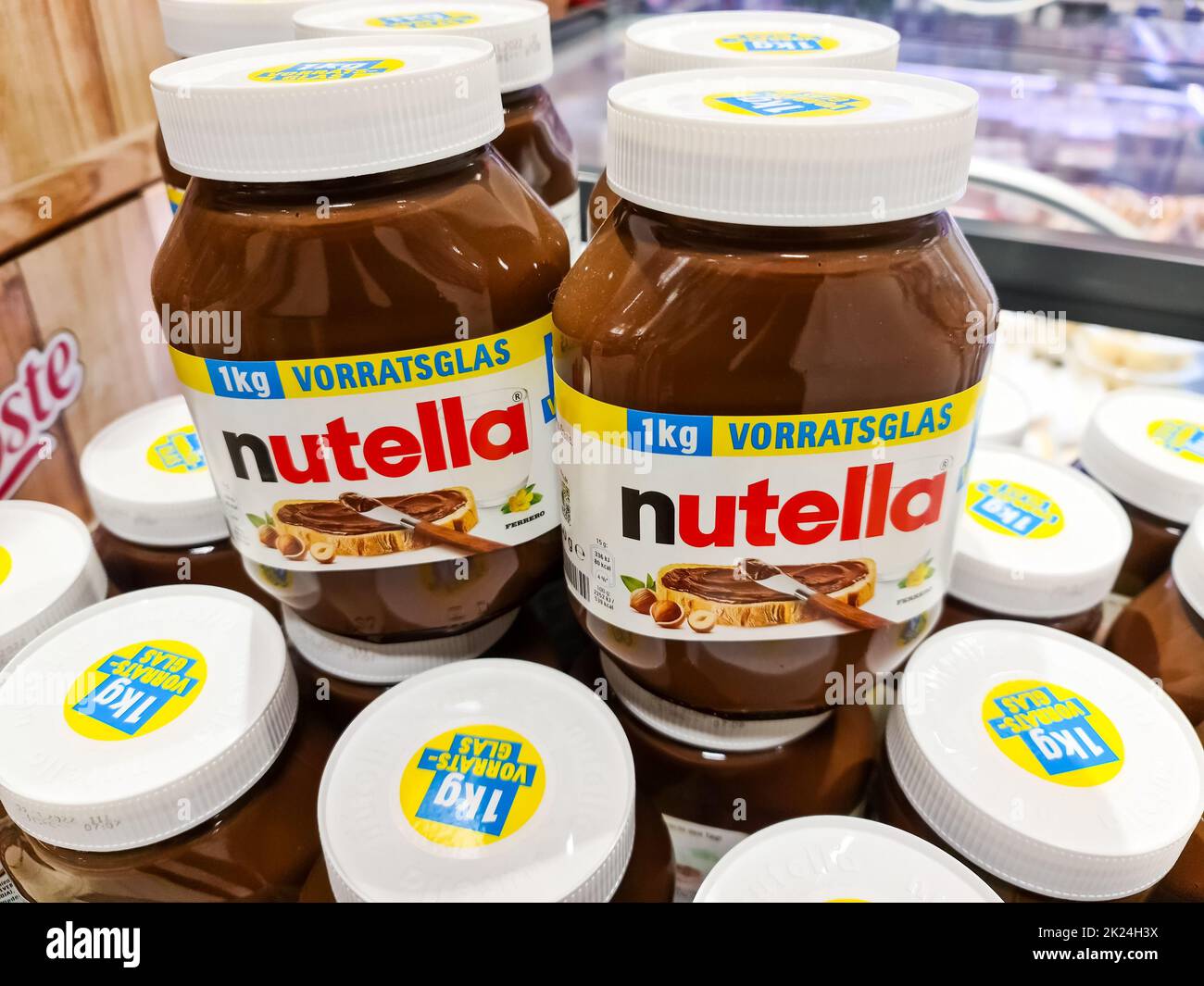 Very large jars of Nutella brand chocolate spread in a supermarket ...
