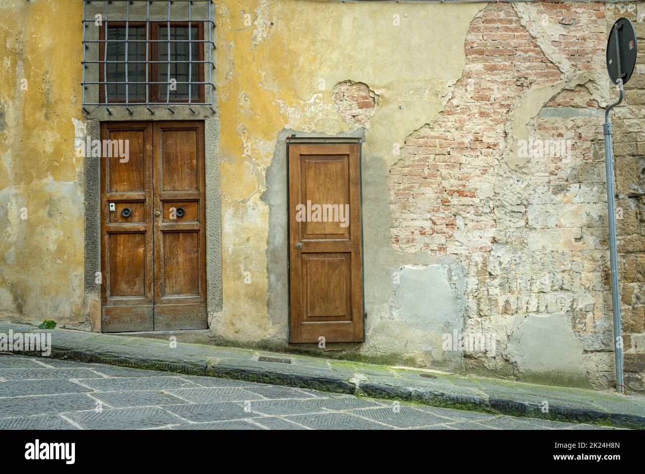 Florence, Italy. January 2022. the entrance doors to an old building on ...
