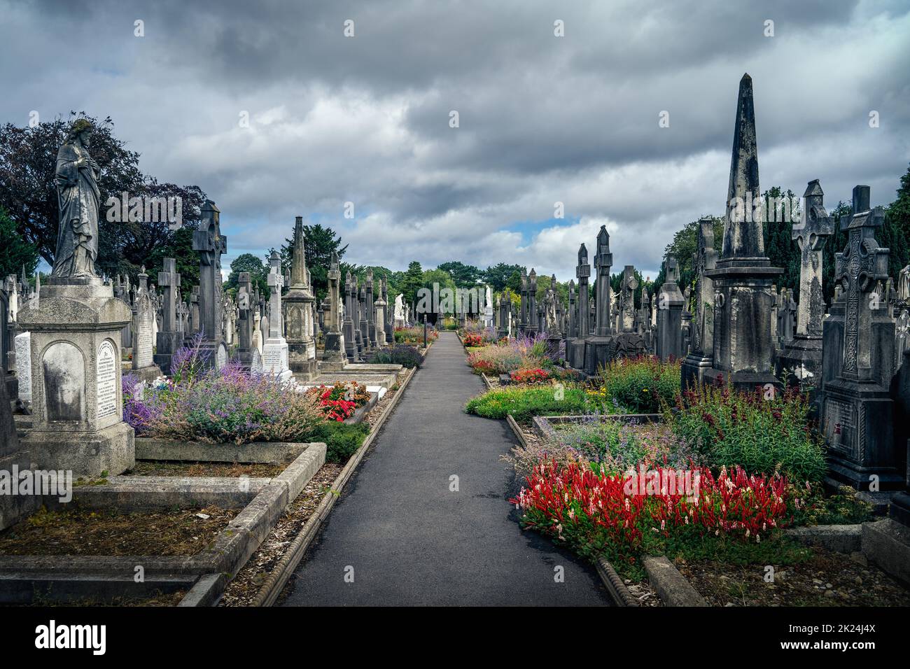 Dublin, Ireland, August 2019 Ancient graves with Celtic crosses and ...
