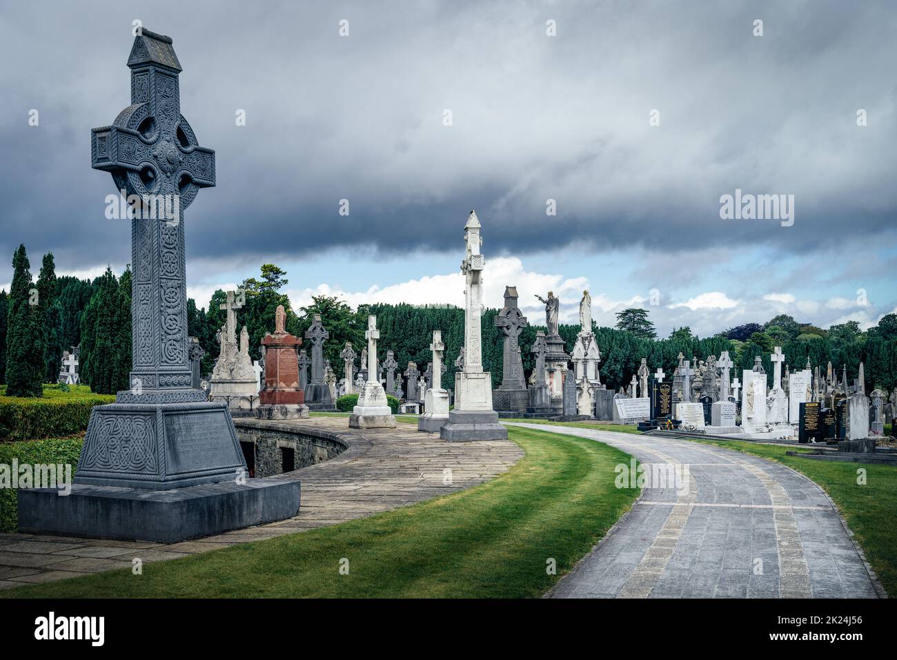 Dublin, Ireland, August 2019 Ancient graves with Celtic crosses and ...