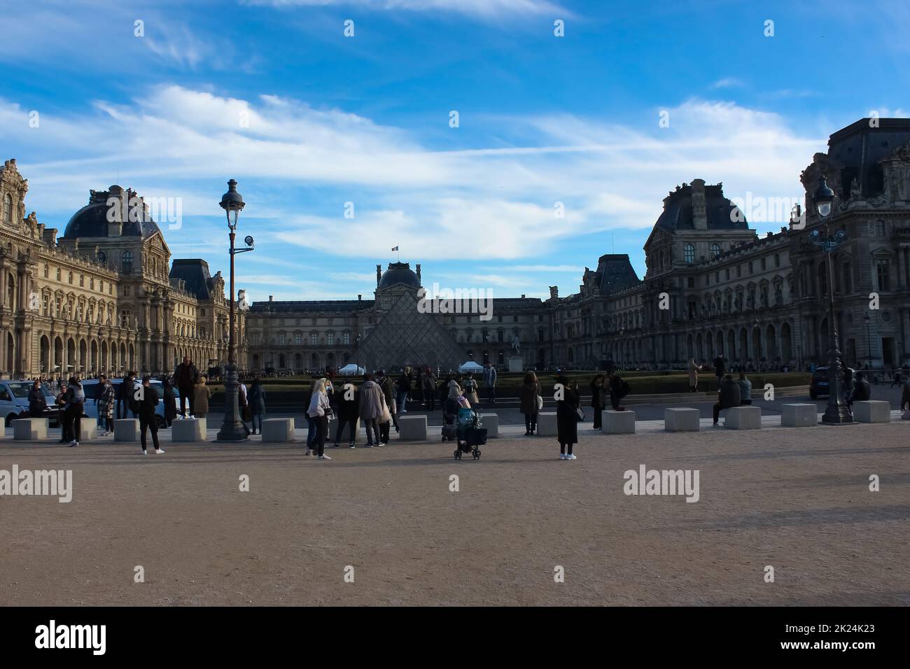 Paris, France - January 01, 2022: People going near Louvre Museum in ...