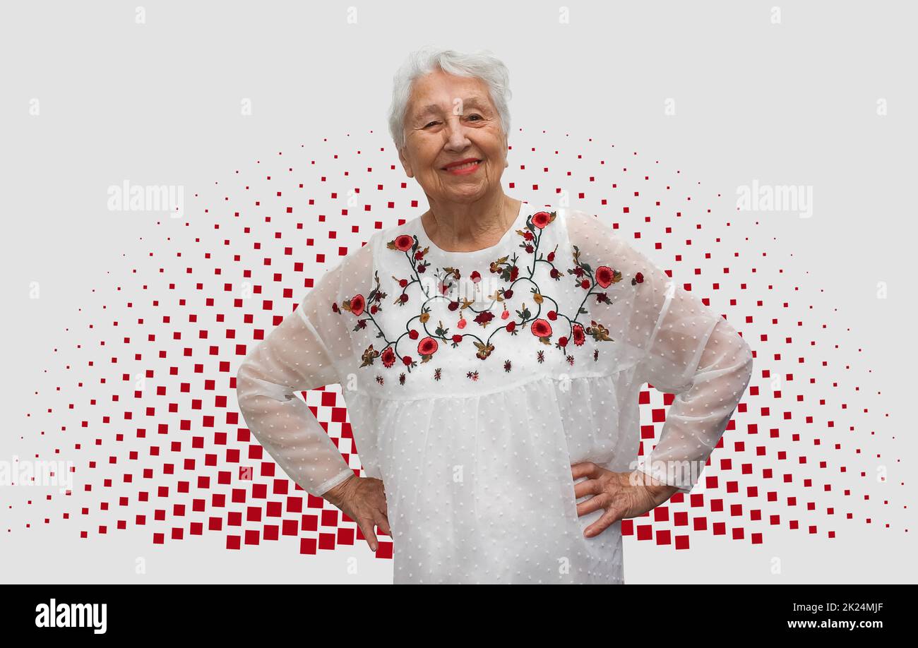 Old smiling woman with happy expression on her face on art studio ...