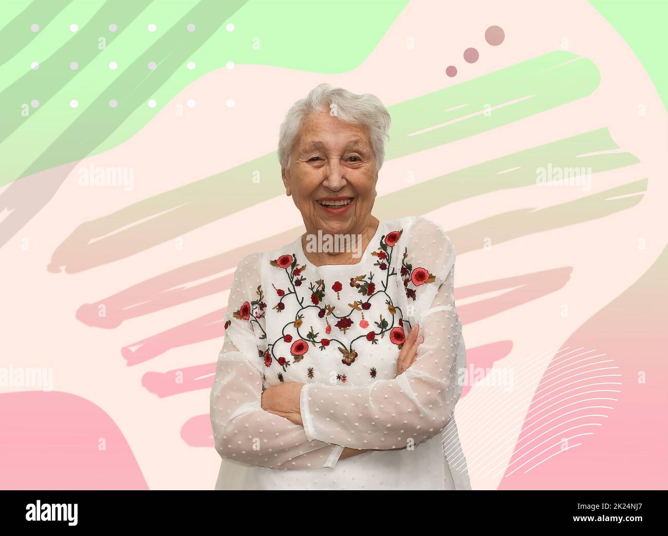 Old smiling woman with happy expression on her face on art studio ...