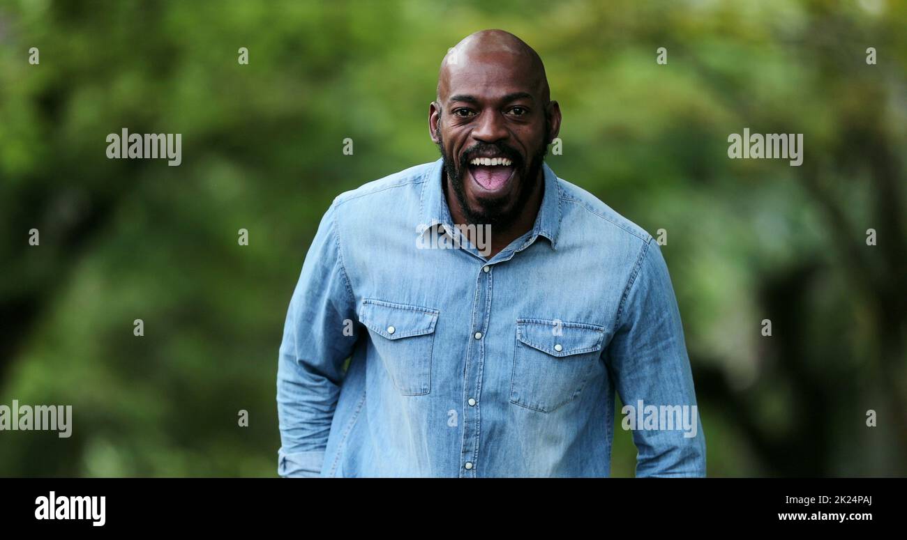 Happy African man dancing celebrating life. Joyful black person laughin ...