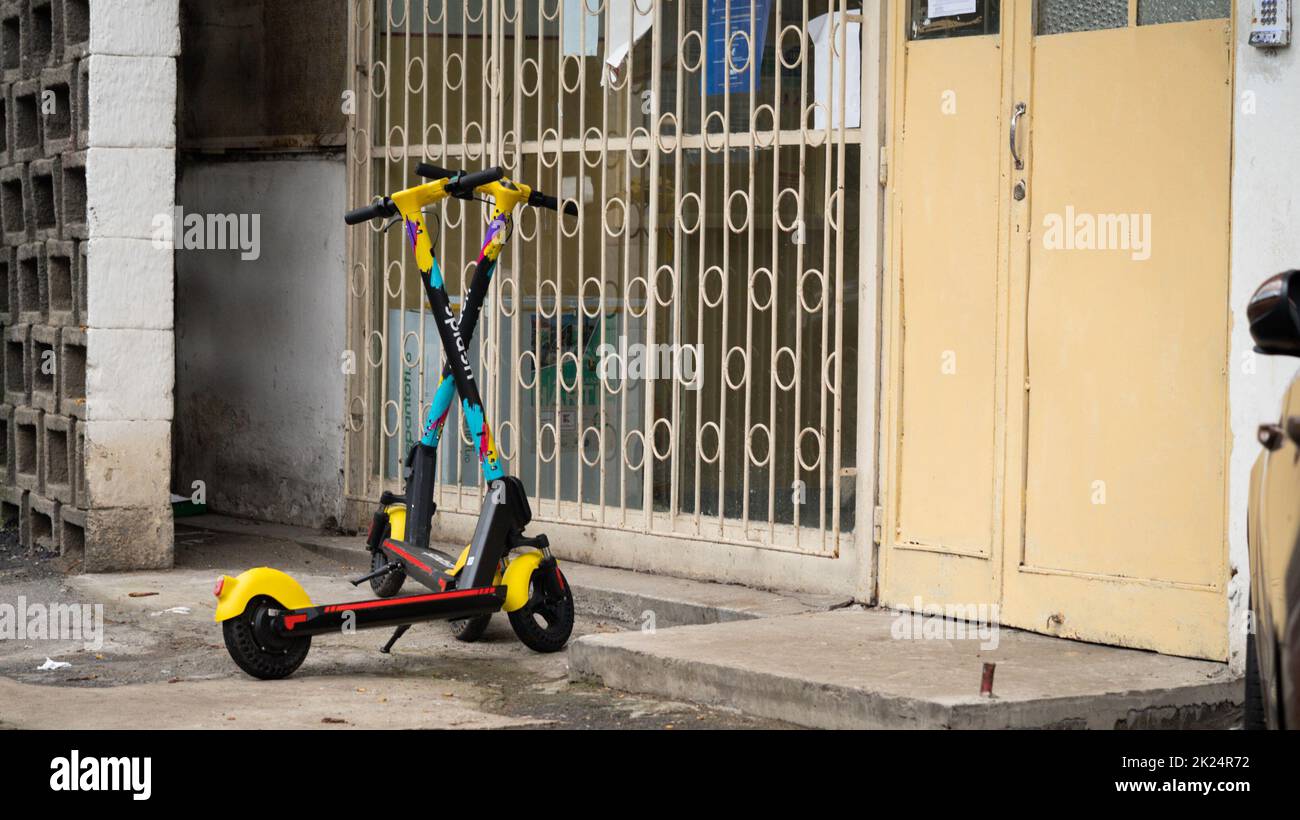 BUCHAREST, ROMANIA - May 15, 2021: Two electric scooters on the ...