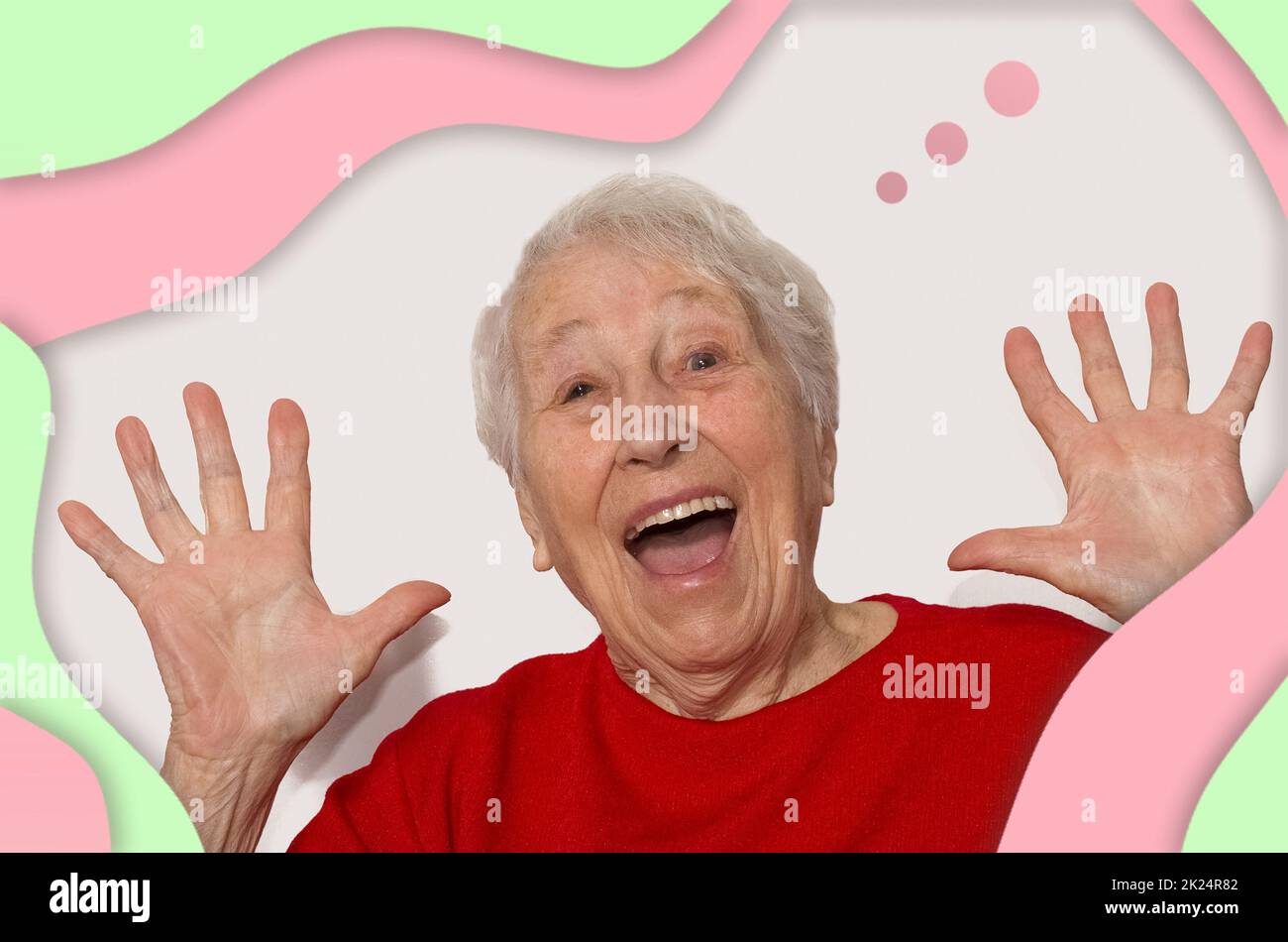 Old smiling woman with happy expression on her face on art studio ...