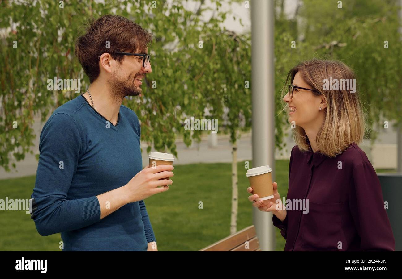 Smiling caucasian businesswoman and man Funny Coversation talking ...