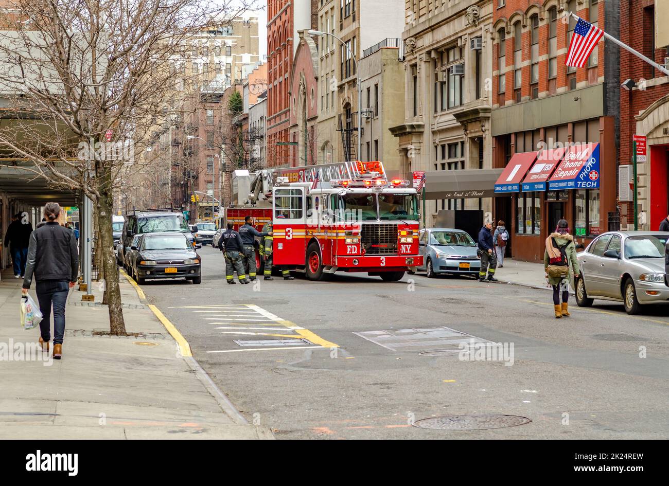 New York City red Fire Department Ladder 3 vehicle on a side street in ...