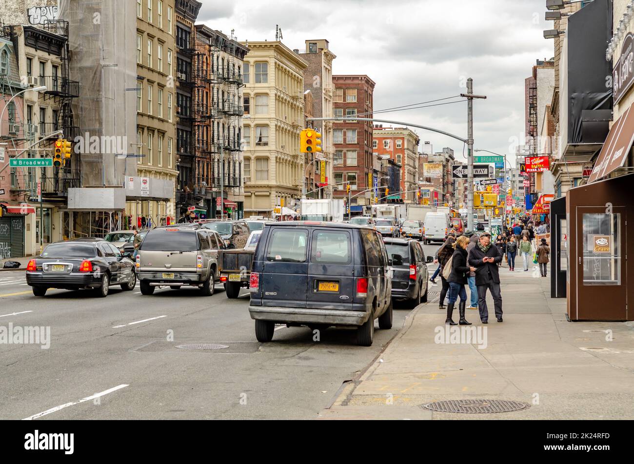 Brooklyn, New York City wide Street with lots of traffic, red traffic ...