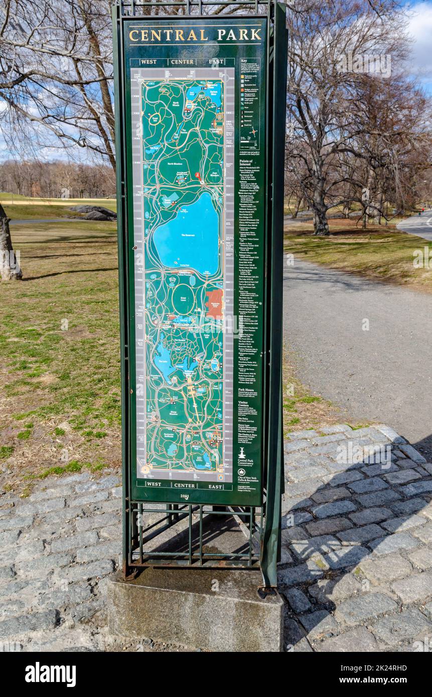 Central Park New York Information Map standing at the entrance of the ...