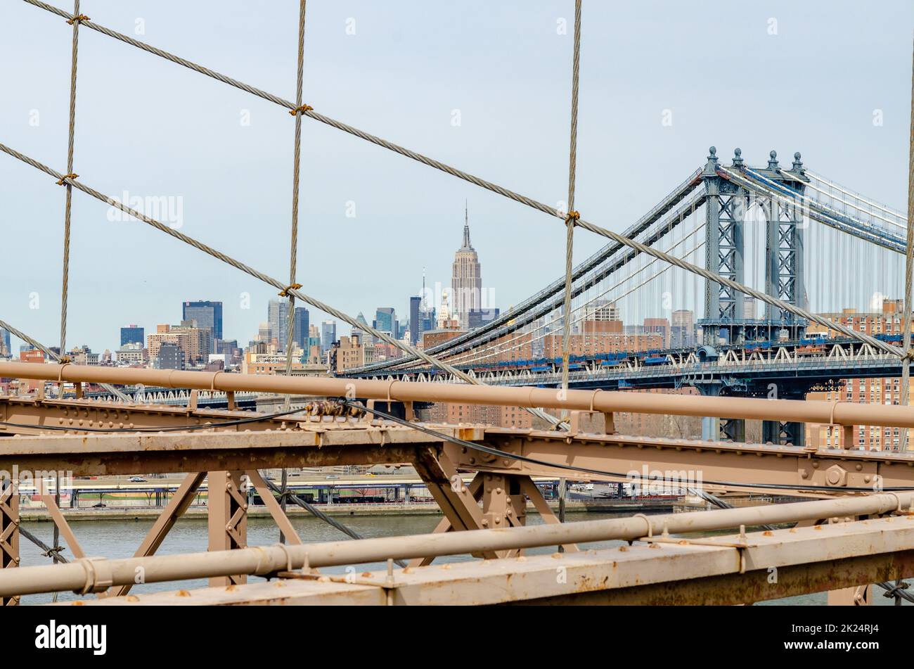 Manhattan Bridge with brown steel construction of Brooklyn Bridge in ...