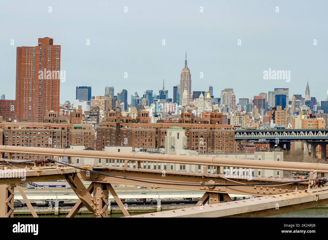 Manhattan Bridge with brown steel construction of Brooklyn Bridge in ...