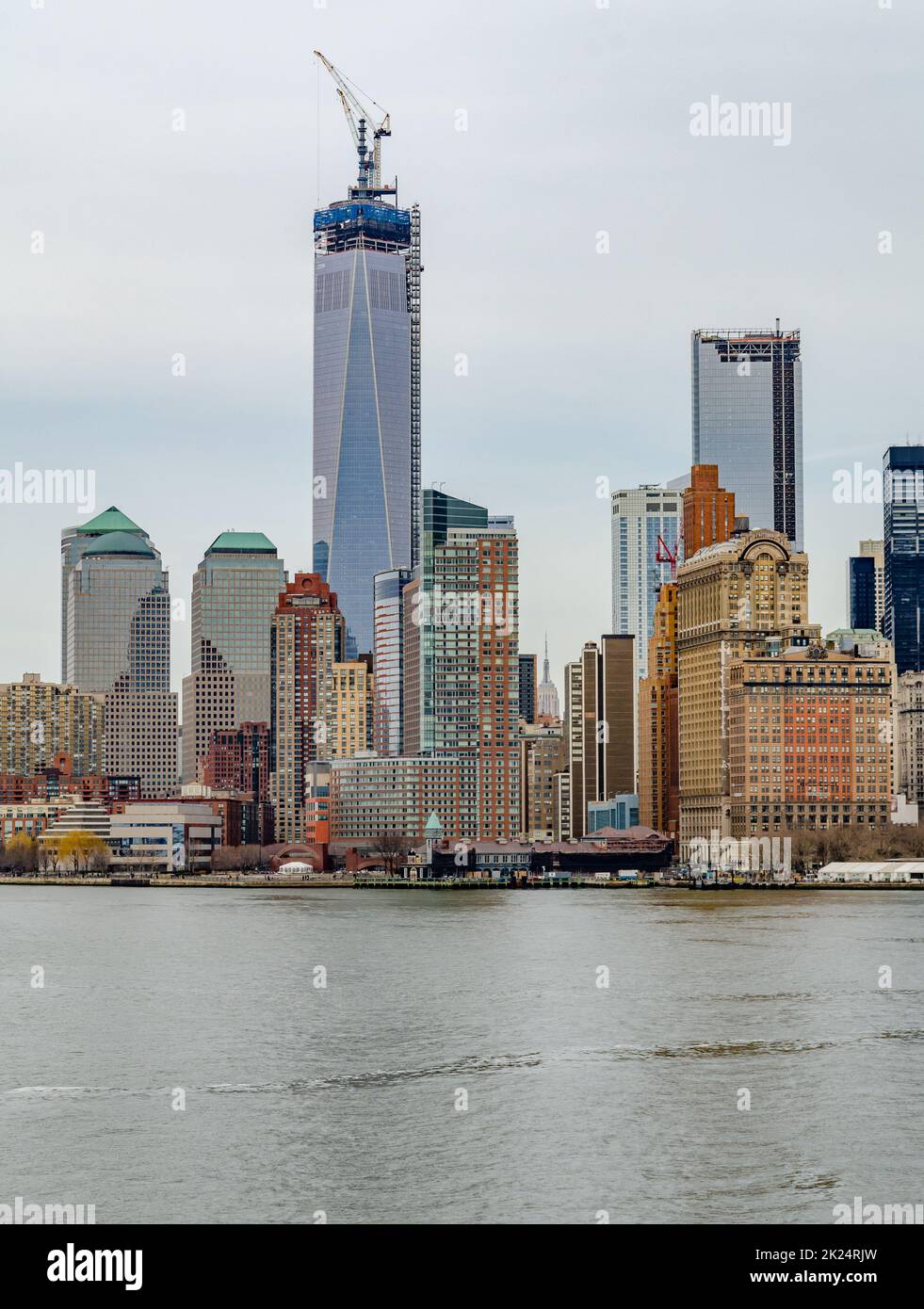 One World Trade Center with construction area and Crane on top of it ...