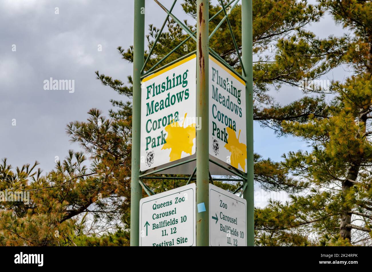 Flushing-Meadows-Corona-Park Sign view from low angle with tree in ...