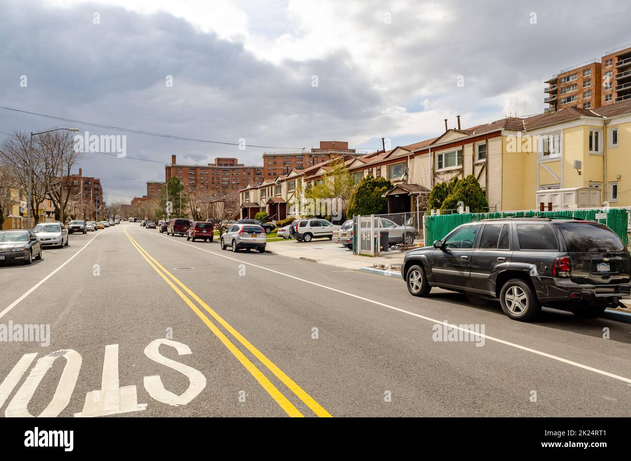 Residential Area in Queens, City street with parked cars and lots of ...
