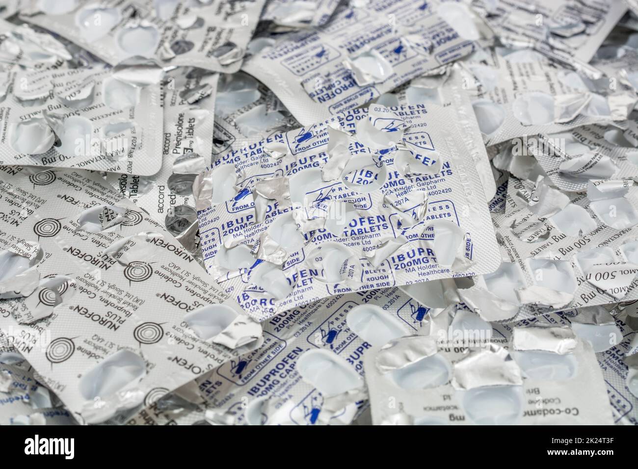 Pile of empty blister packed pills of assorted shapes and sizes (see ...