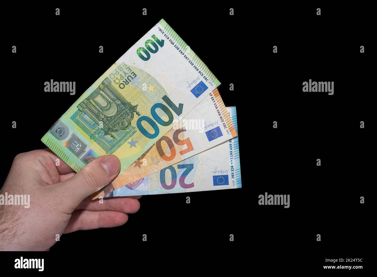 hand helding three euro bank notes inflation in the world at the ...