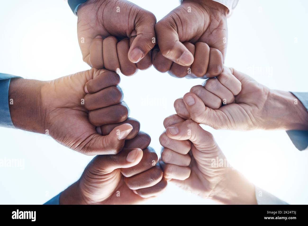 Diversity, fist bump and success of a corporate team collaboration ...