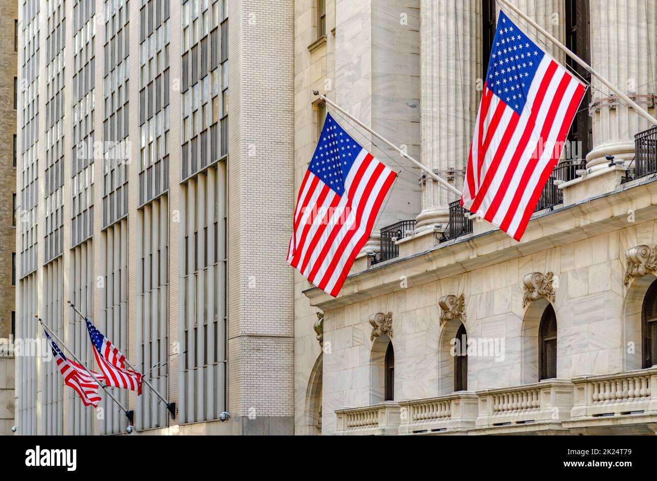 American Flags hanging down at New York Stock Exchange, Building with ...