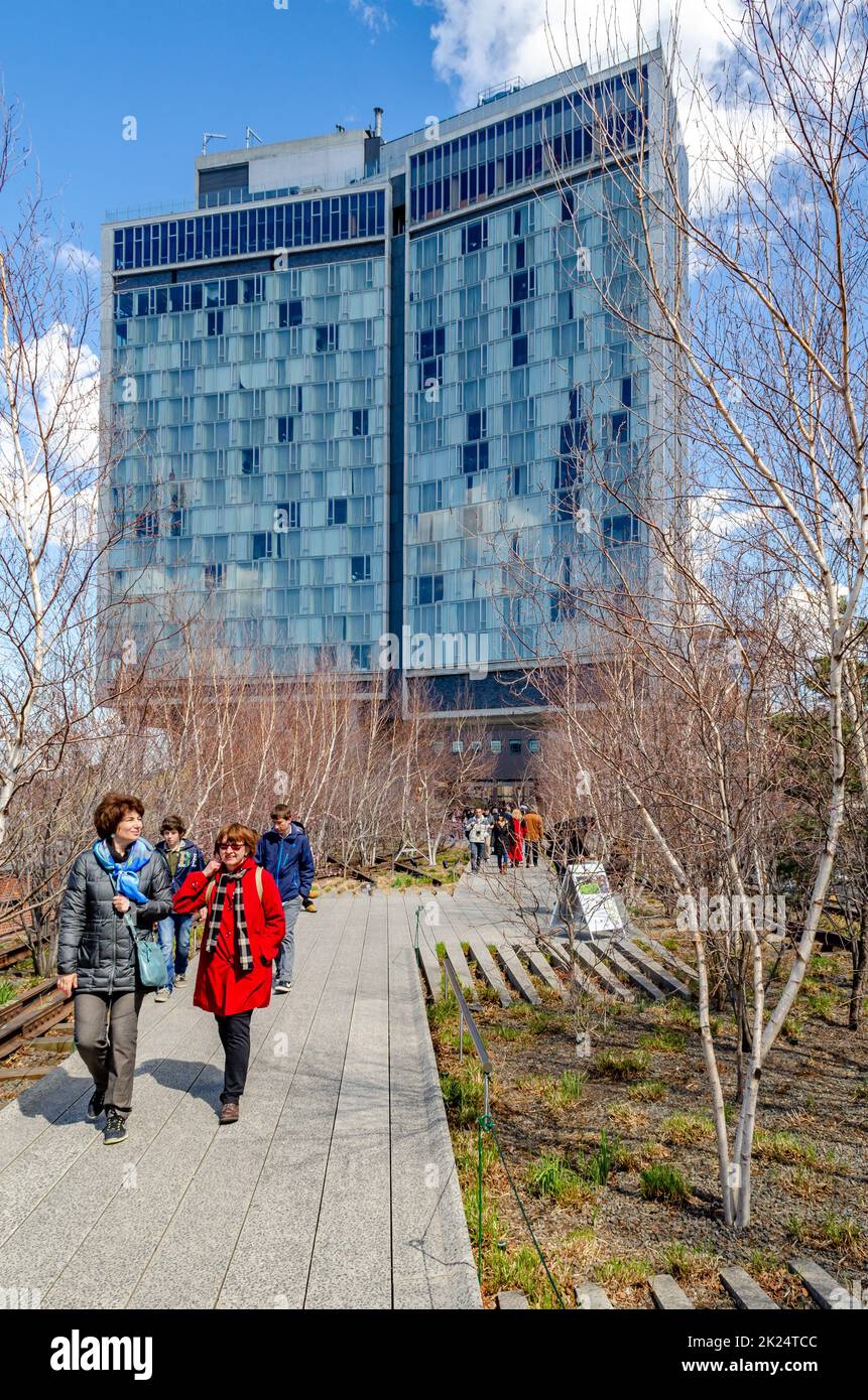 The High Line Rooftop Park, Chelsea, with walking people in front of a ...