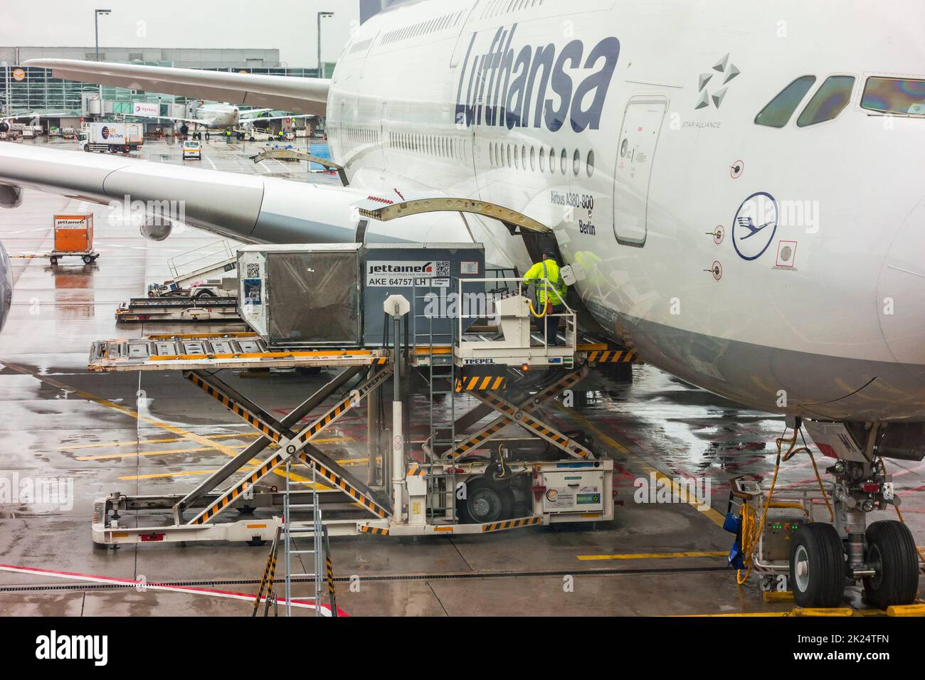 Loading jetliner hi-res stock photography and images - Alamy
