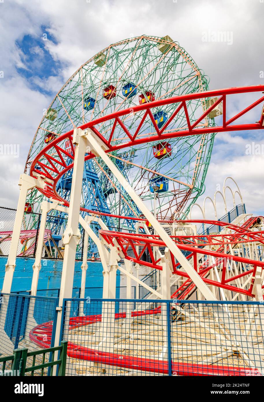 Red Rollercoaster at Luna Park Amusement Park with Wonder Wheel Ferris ...