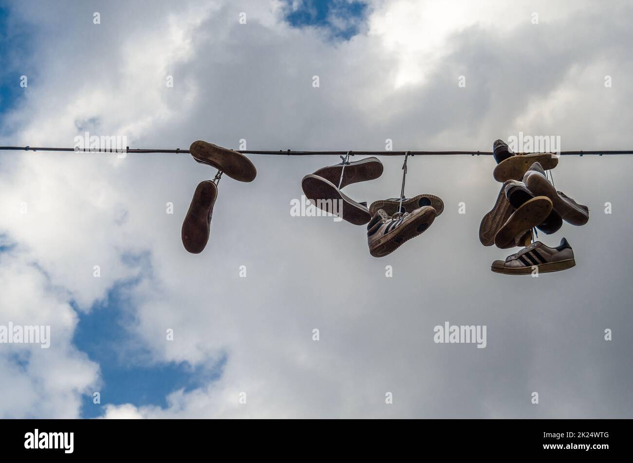 GHENT, BELGIUM - AUGUST 20, 2013: Shoe-tossing in Ghent, Belgium. Shoe ...