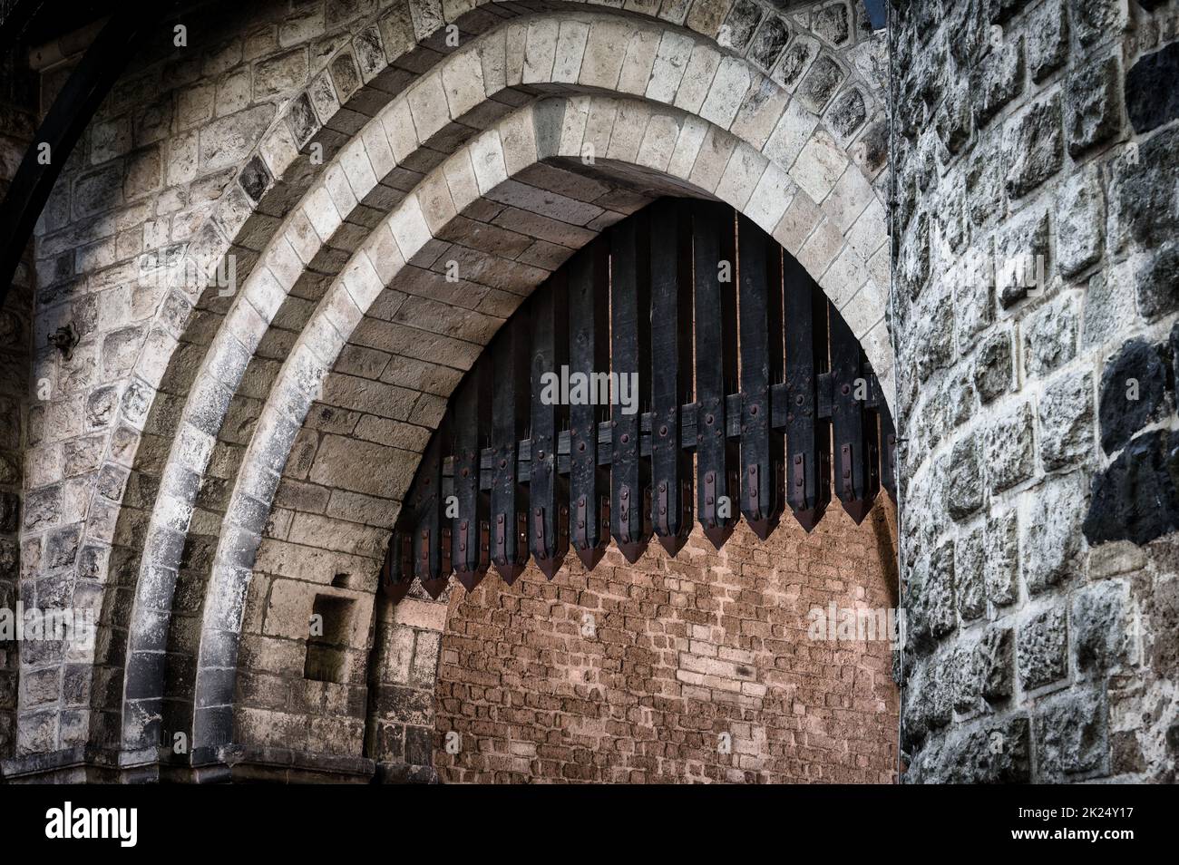 wooden portcullis with metal spikes on a medieval town gate in cologne ...