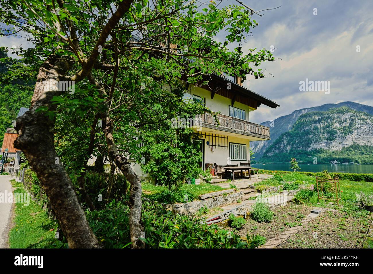 Old vintage house over Austrian alps in Hallstatt, Salzkammergut ...