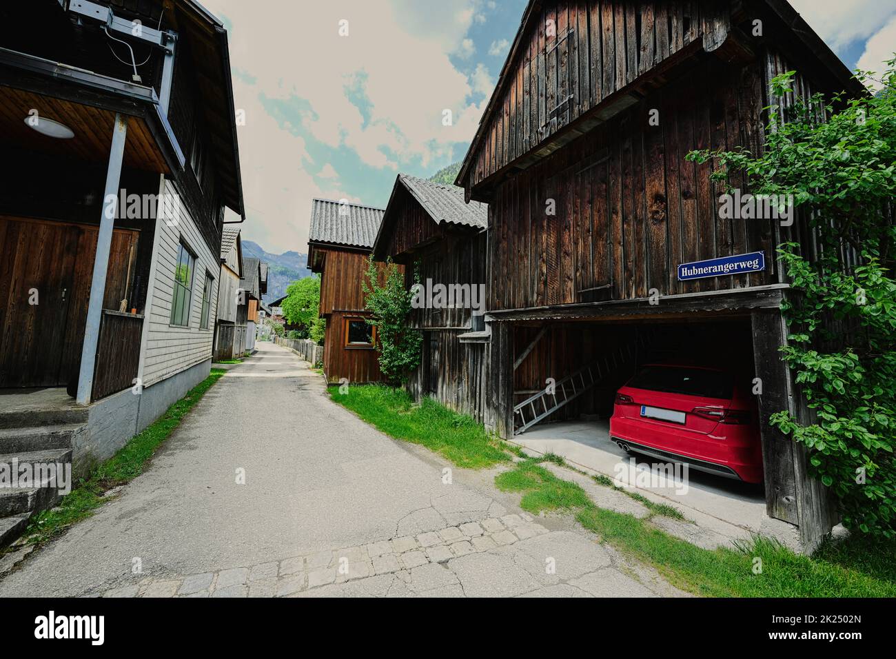 Old vintage houses over Austrian alps in Hallstatt, Salzkammergut ...