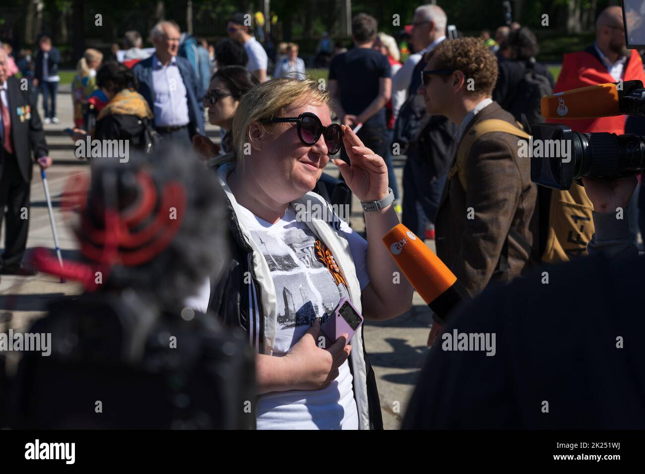 BERLIN - MAY 09, 2022: Victory Day in Treptower Park. A visitor to the ...