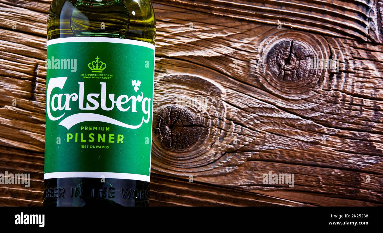 POZNAN, POL - APR 13, 2022: Bottle of Carlsberg pale lager beer ...