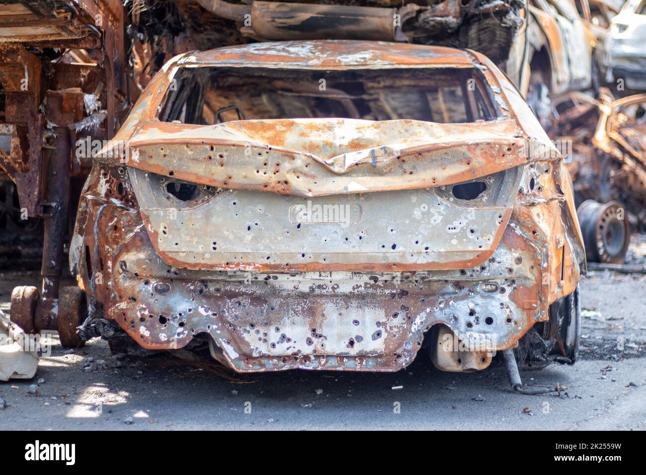 Russian invasion of Ukraine in 2022, destroyed and burned cars. Cars ...