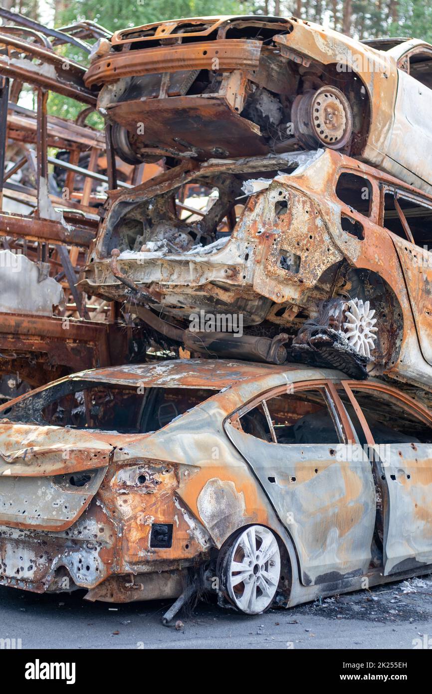 A lot of rusty burnt cars in Irpen, after being shot by the Russian ...